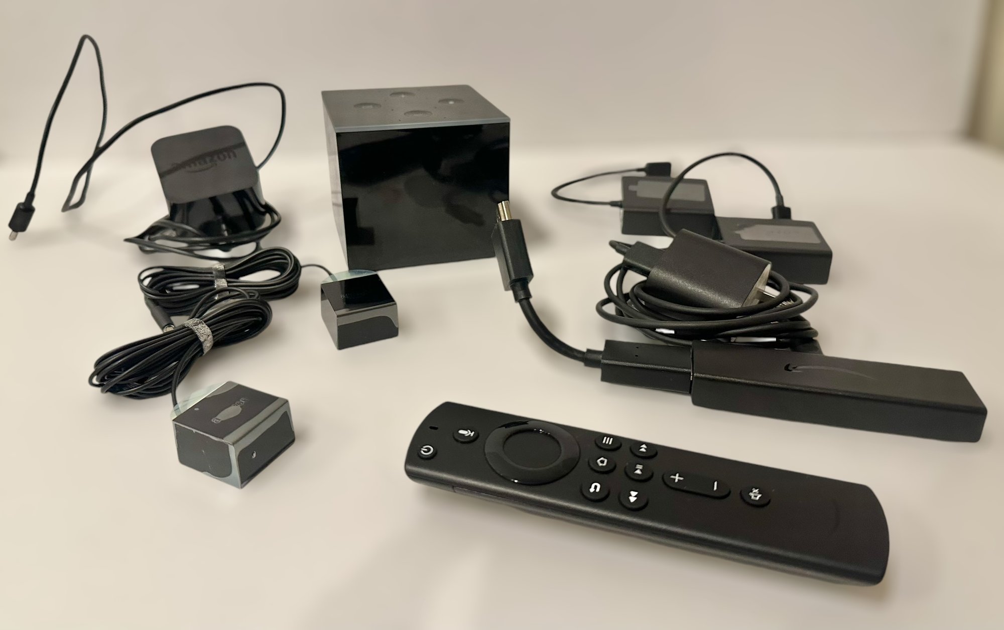 Amazon Fire Stick Cube W/ Remotes And Extra Cords #15178 | Auctionninja.com