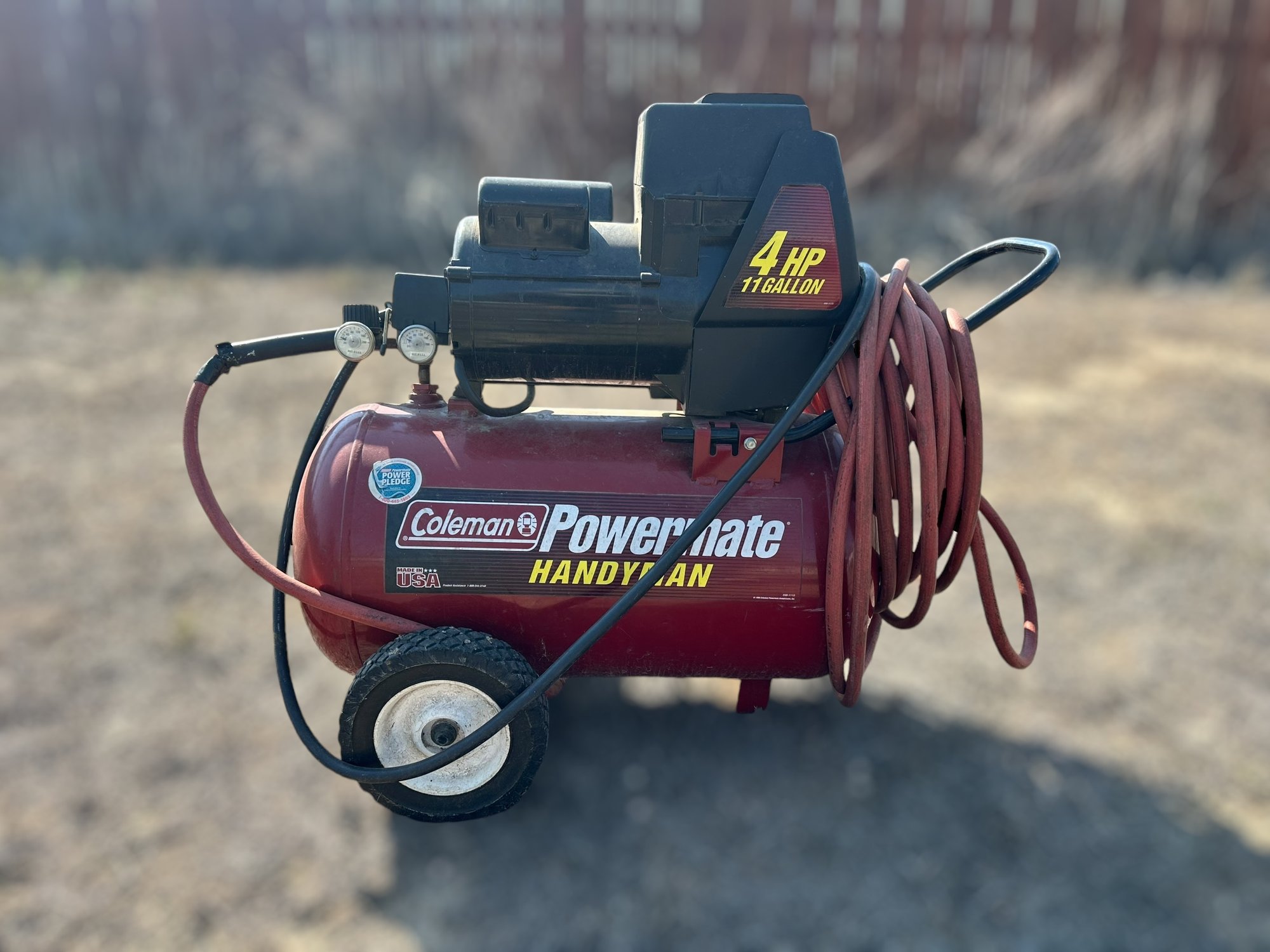Coleman Powermate Handyman Air Compressor W/ Hose #14472 | Auctionninja.com
