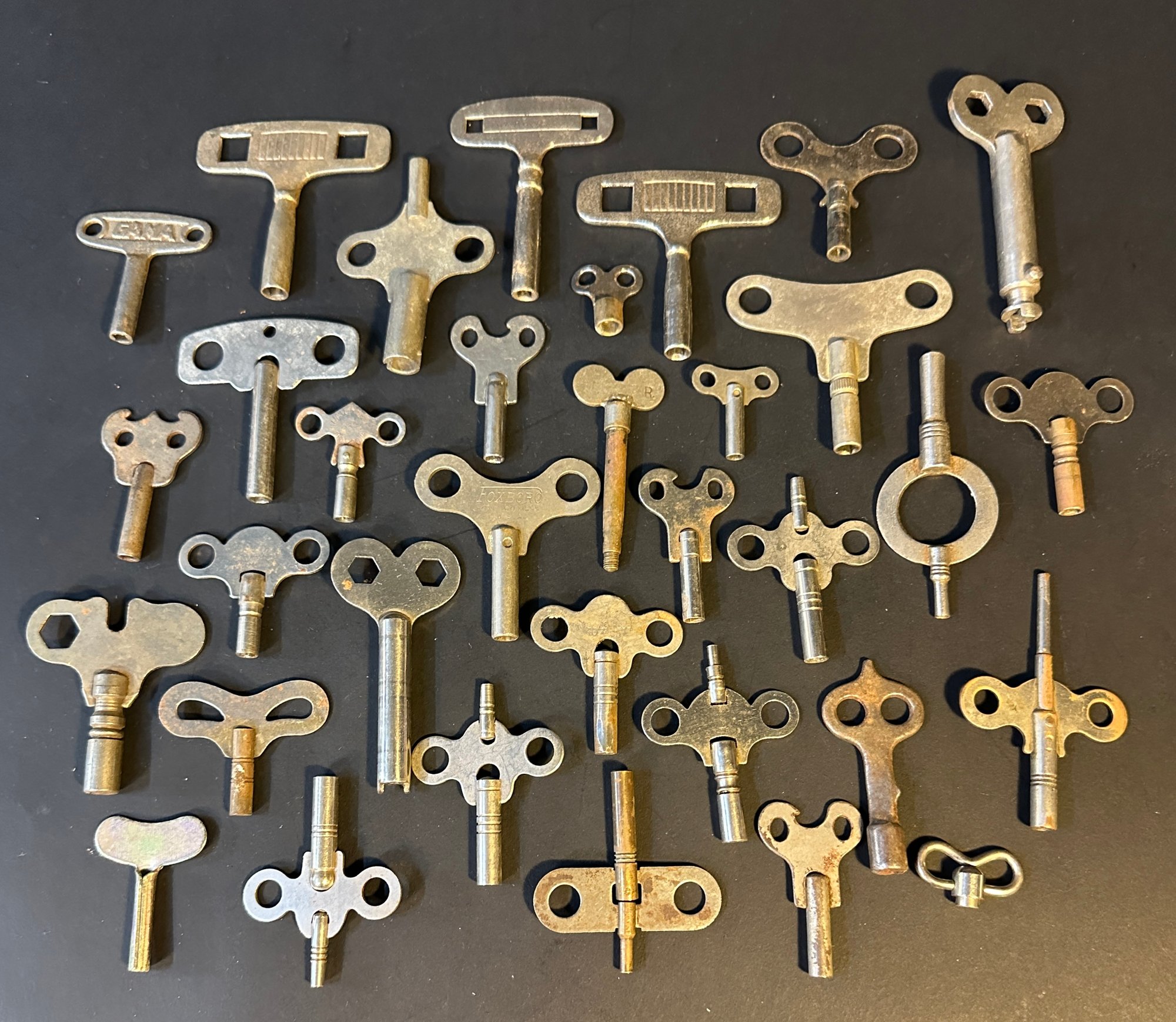 A Group Of Antique Clock Keys #2238 | Auctionninja.com