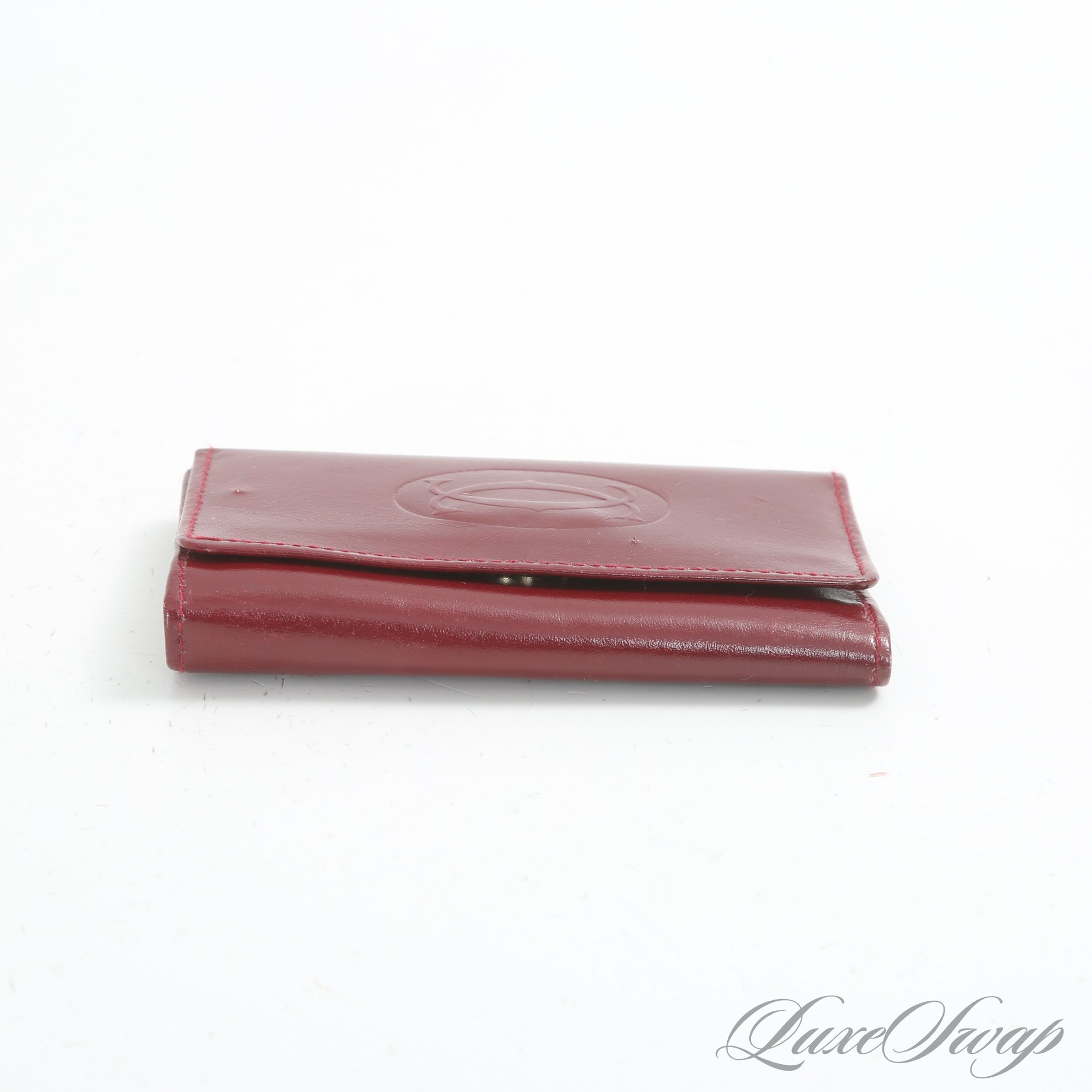 VINTAGE 1980S CARTIER PARIS SIGNATURE MAROON EMBOSSED CC MONOGRAM ...