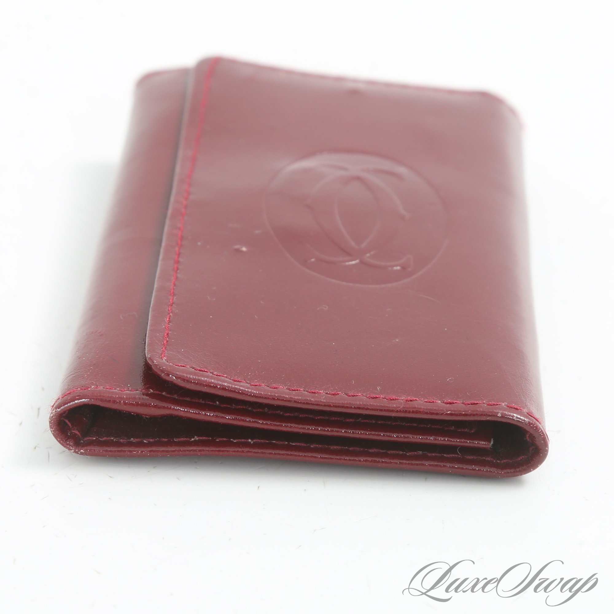 VINTAGE 1980S CARTIER PARIS SIGNATURE MAROON EMBOSSED CC MONOGRAM ...