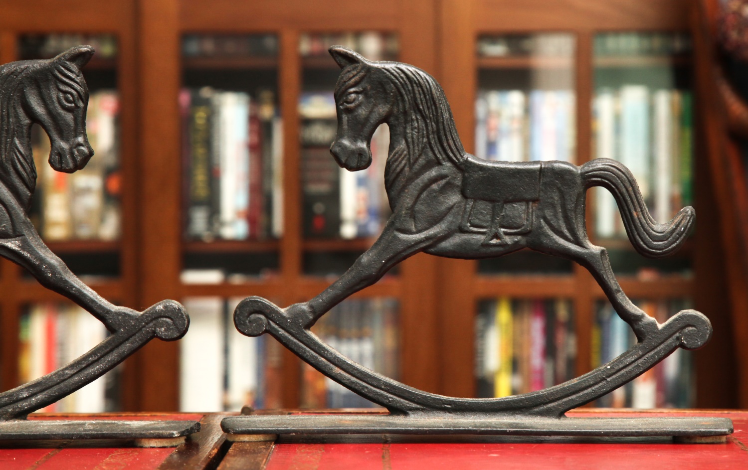 PAIR OF ROCKING HORSE-FORM CAST IRON DOORSTOPS #46199 | Auctionninja.com