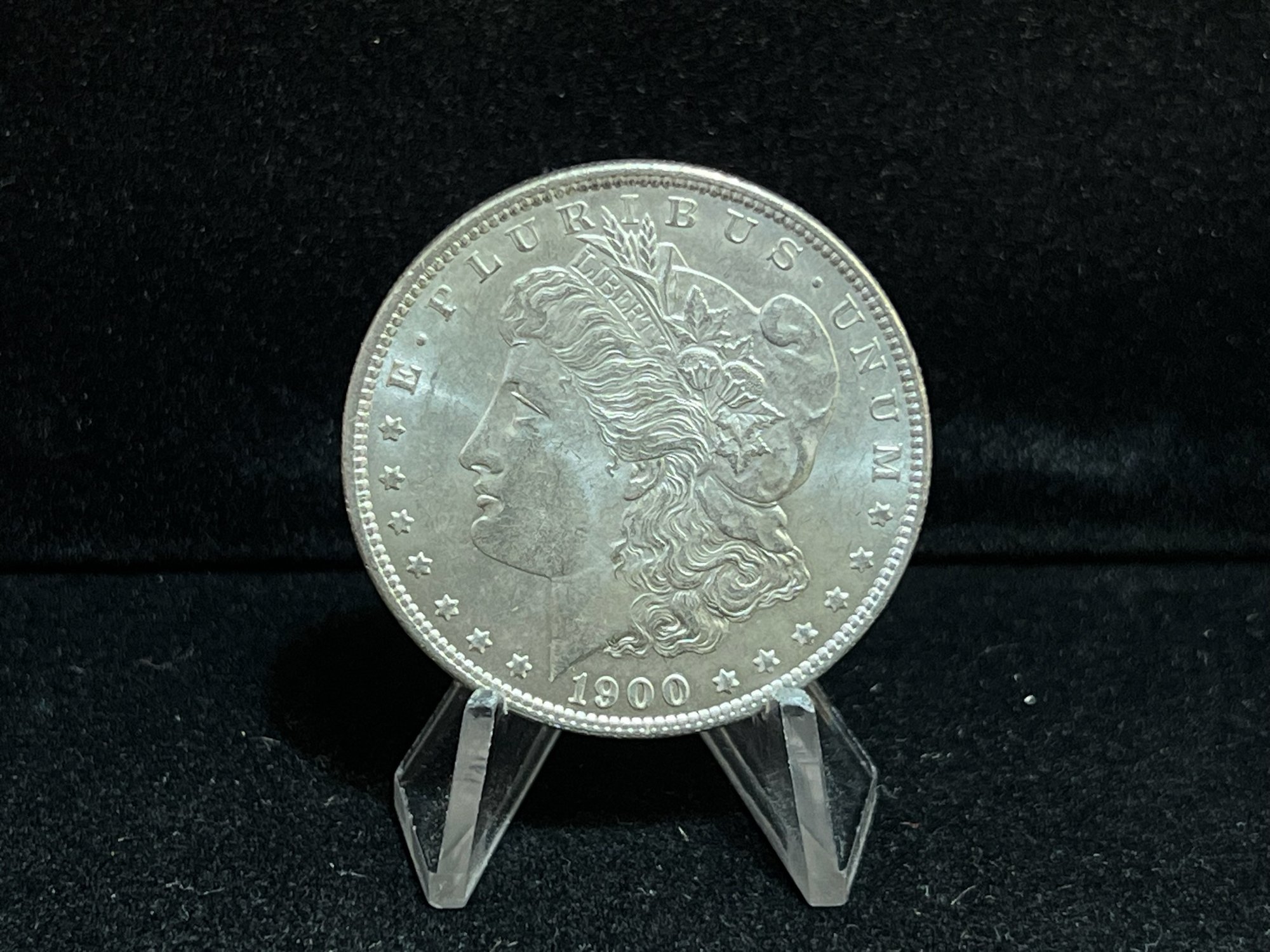 1900 P Morgan Silver Dollar - Uncirculated #18338 | Auctionninja.com