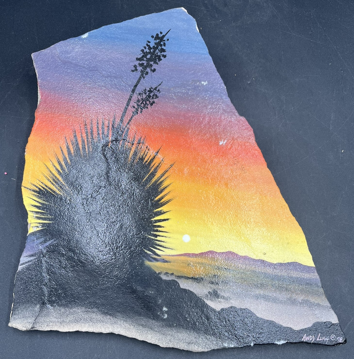 Andy Luna Painting On Rocks Slab - (B2S) #38684 | Auctionninja.com
