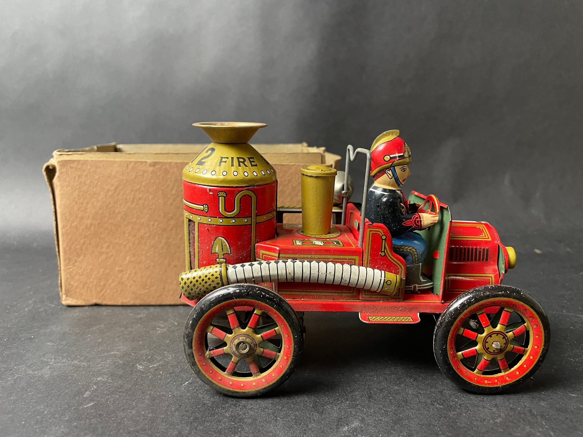 Vintage Pressed Tin Fire Truck "Engine 1912" #109648 | Auctionninja.com