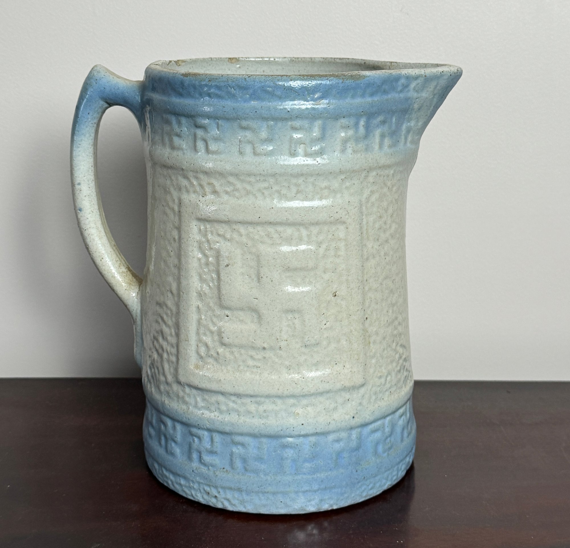 Antique Stoneware Pitcher With Peace Motif #111682 | Auctionninja.com