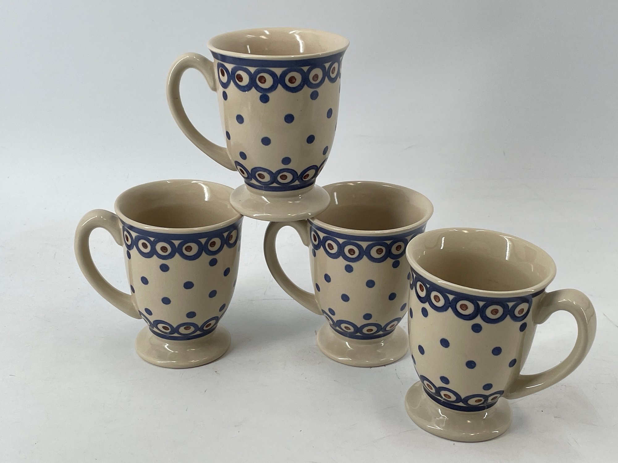 Set Of Four Polish Style Pottery Mugs #137735 | Auctionninja.com