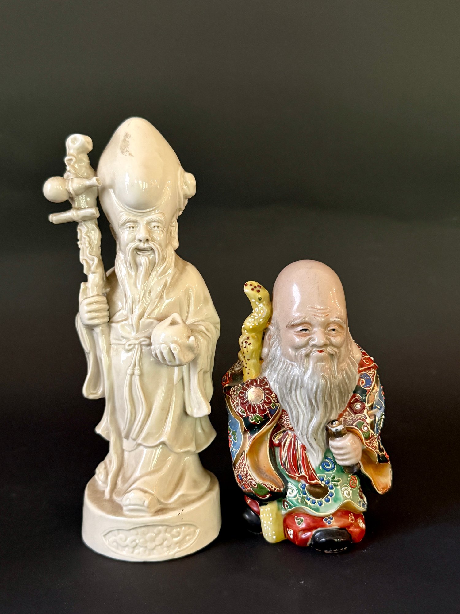 Two Porcelain Statues Of The Asian God Of Wisdom And Longevity #33839 ...