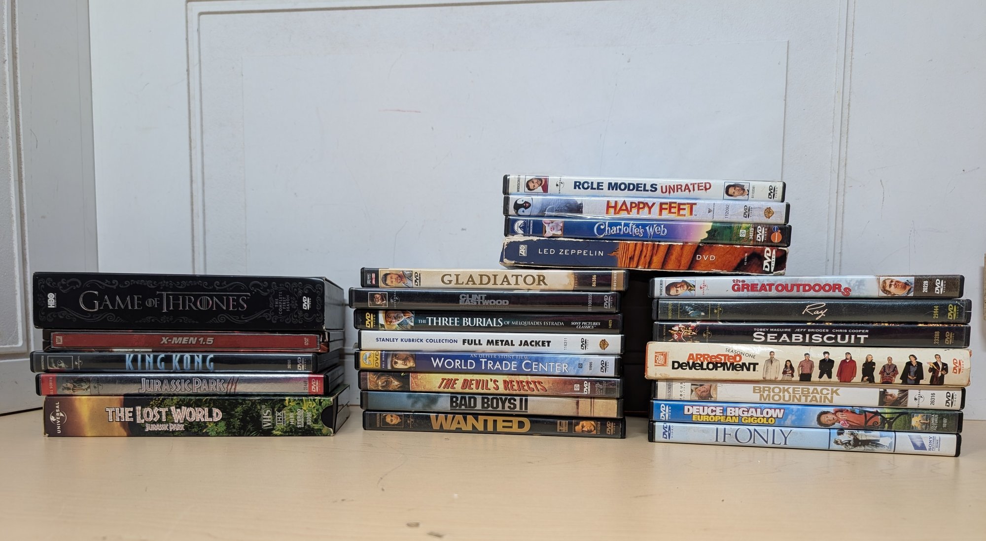 Lot Of Mixed DVDs And VHS Movies Including Game Of Thrones And Jurassic ...
