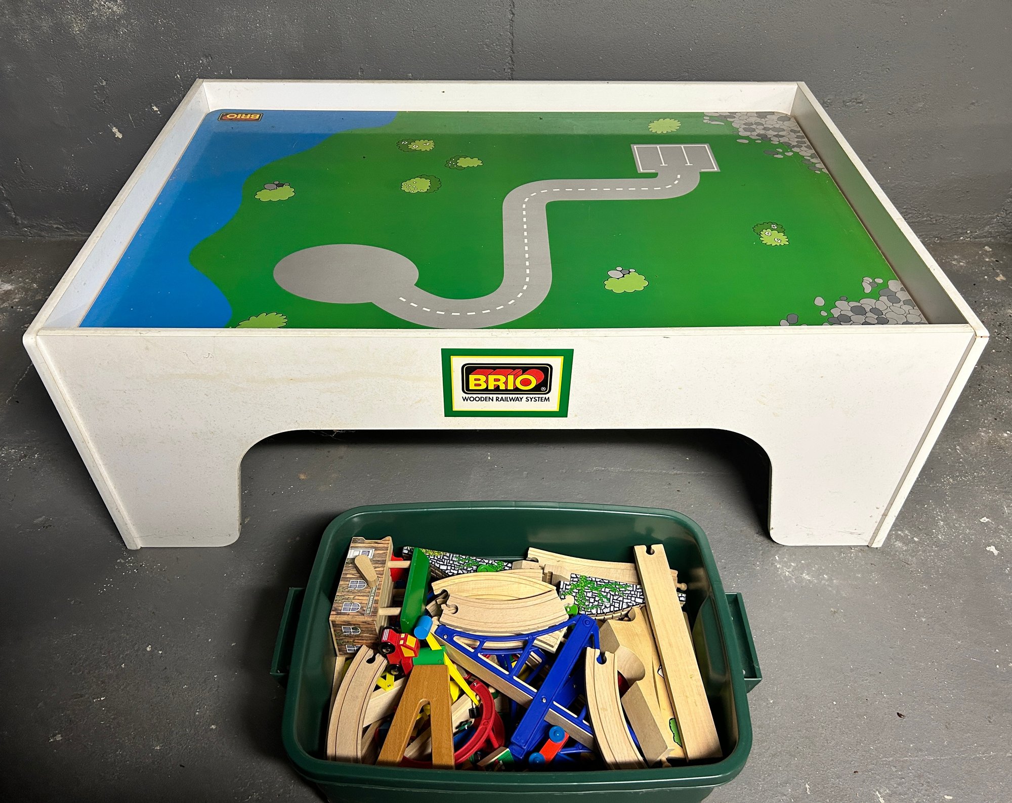 Brio Wooden Train Table With An Assortment Of Wooden Train Track Pieces ...