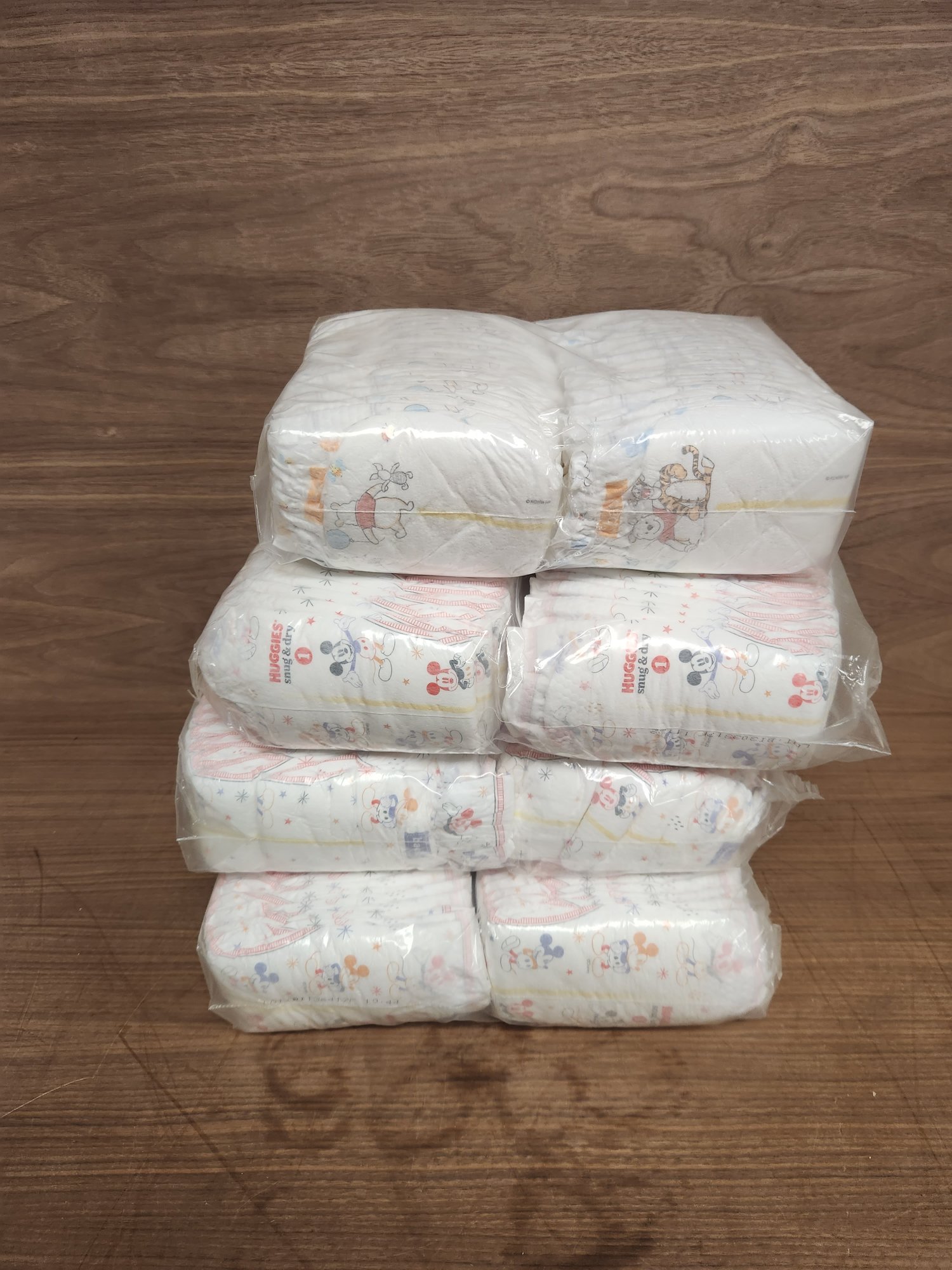 Four Pack Of Disney Mickey And Winnie The Pooh Huggies Baby Diapers ...