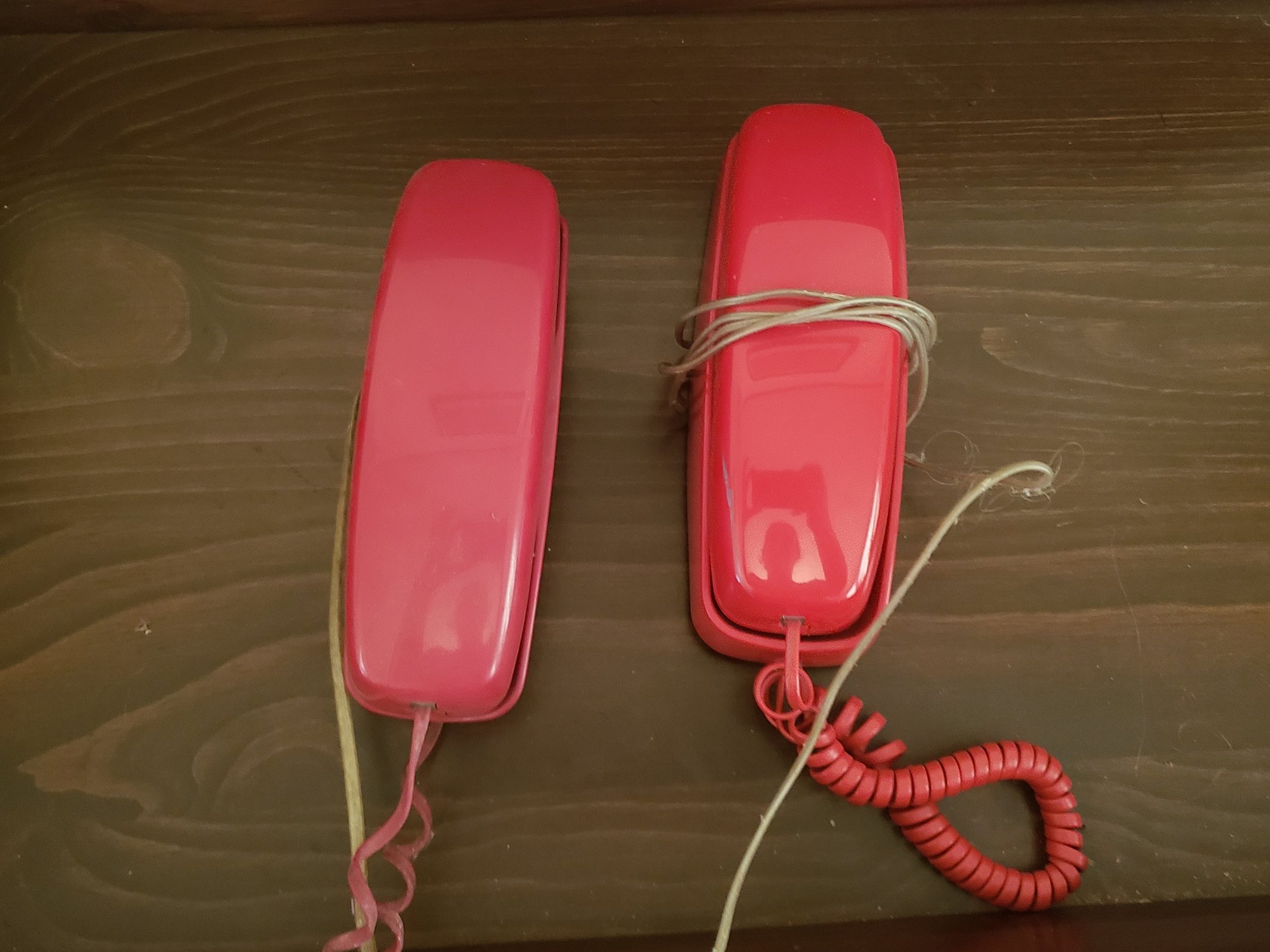 Pair Of Vintage Red Landline Princess Phones #2122389 | Auctionninja.com