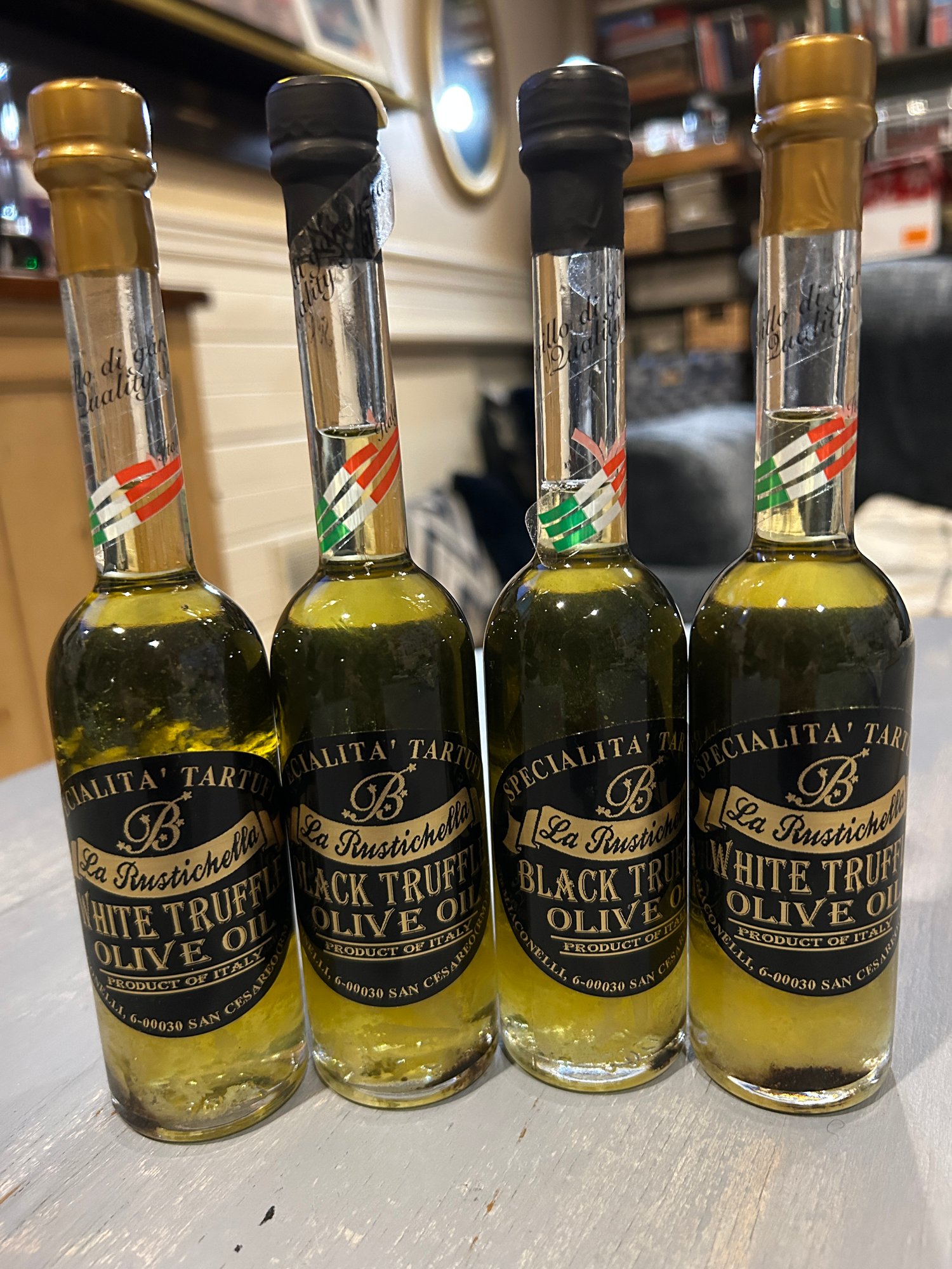 4 New Fancy Truffle/Olive Oils #2037538 | Auctionninja.com