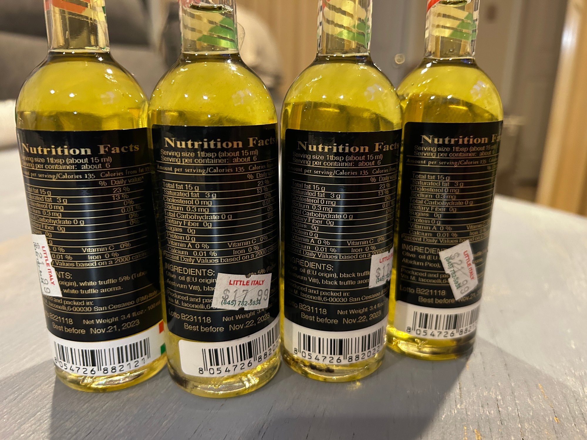 4 New Fancy Truffle/Olive Oils #2037538 | Auctionninja.com