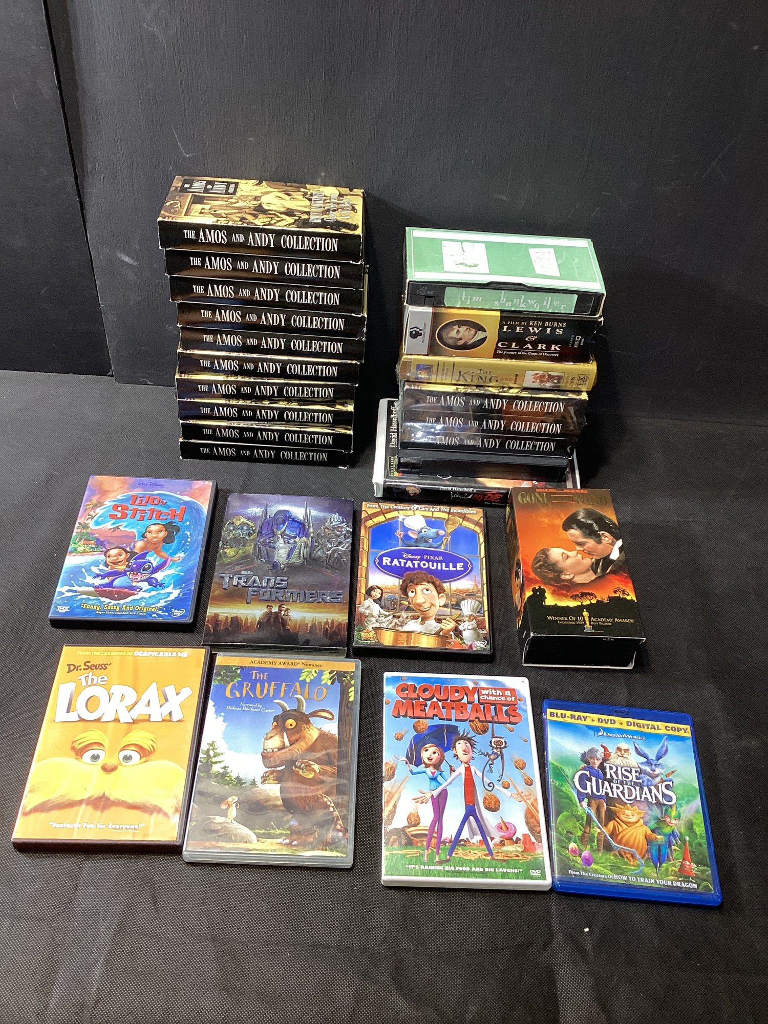 Large Lot Of VHS And DVDs, Some Not Even Opened #8474 | Auctionninja.com