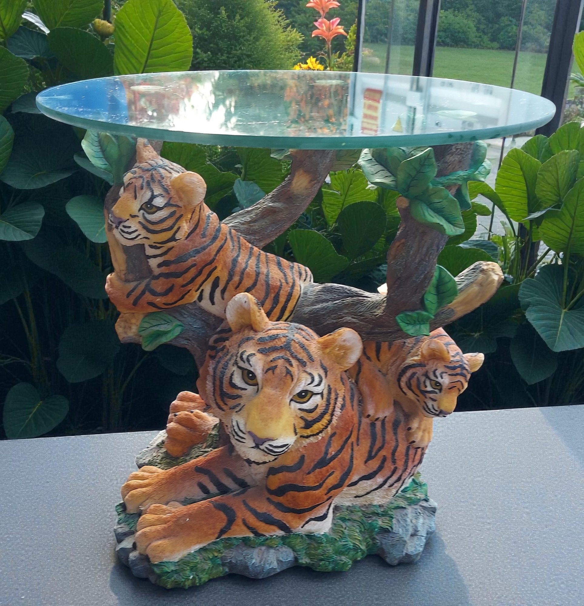 Glass Top Tiger Family Table #2207681 | Auctionninja.com