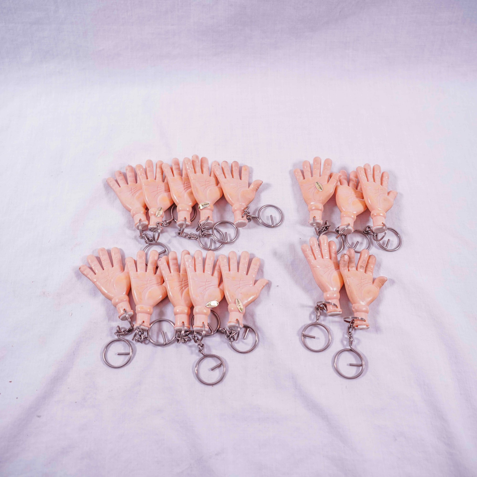 Vintage Flexible Hand Keychains #1167 | Auctionninja.com