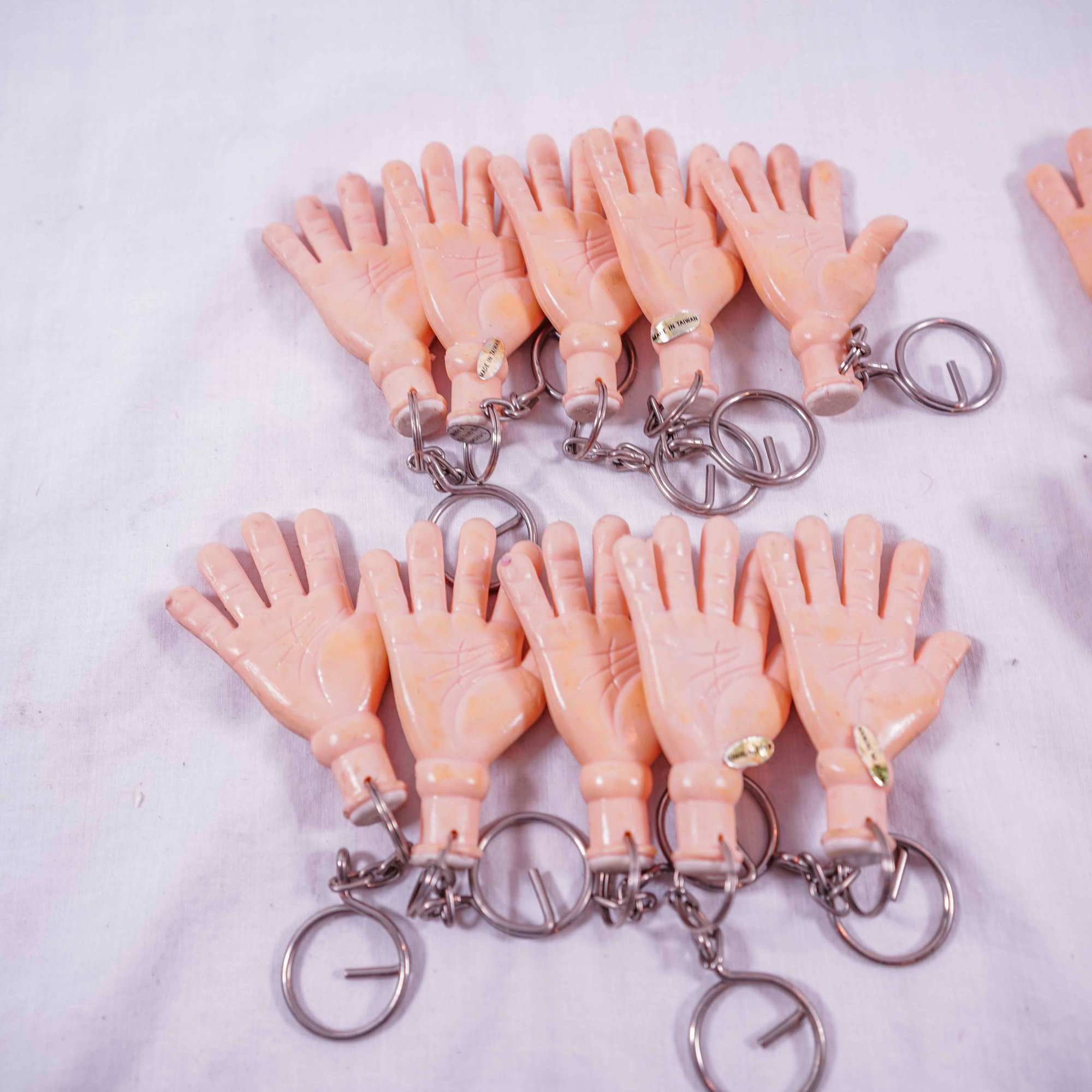 Vintage Flexible Hand Keychains #1167 | Auctionninja.com