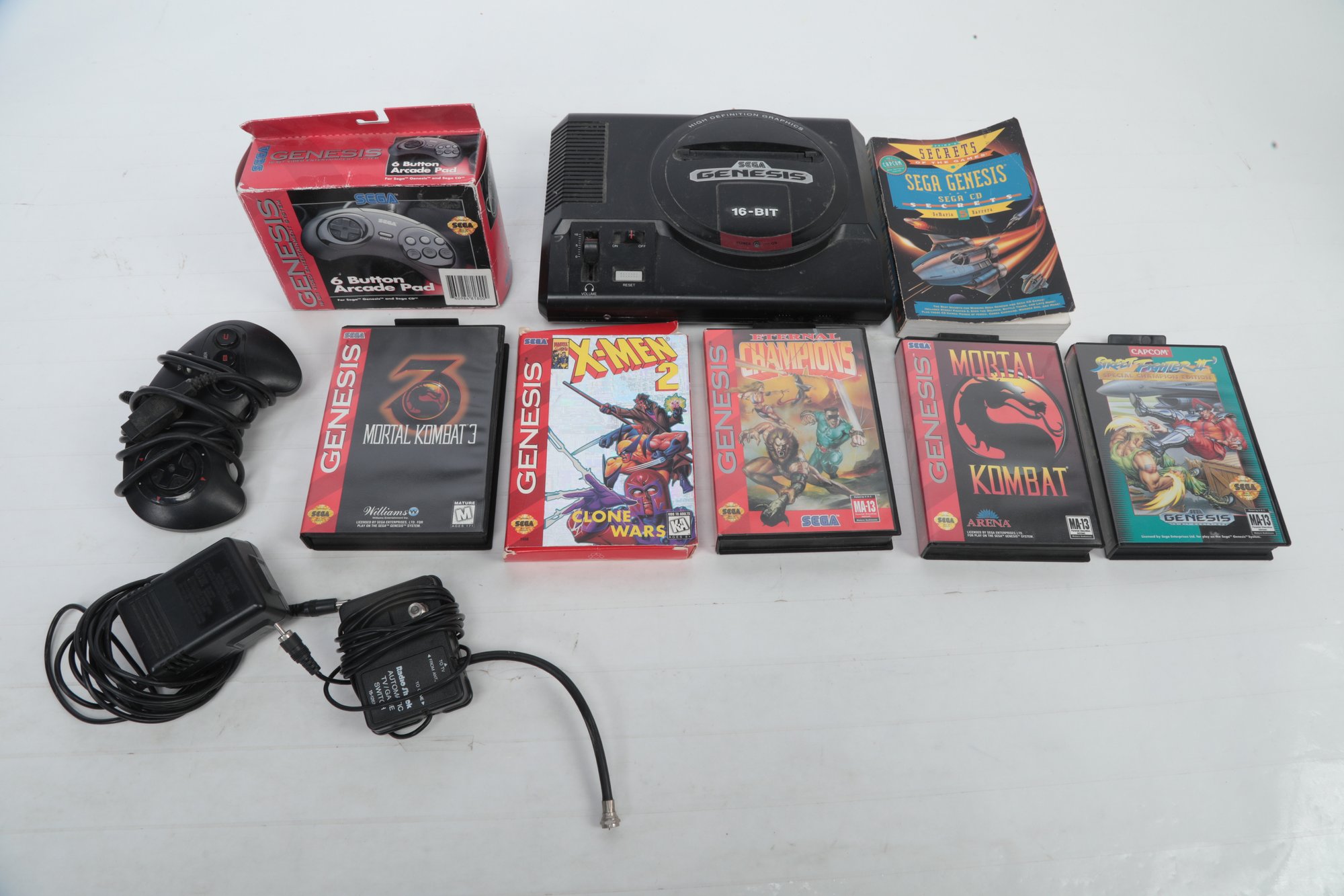 Sega Genesis System With Games #193697 | Auctionninja.com
