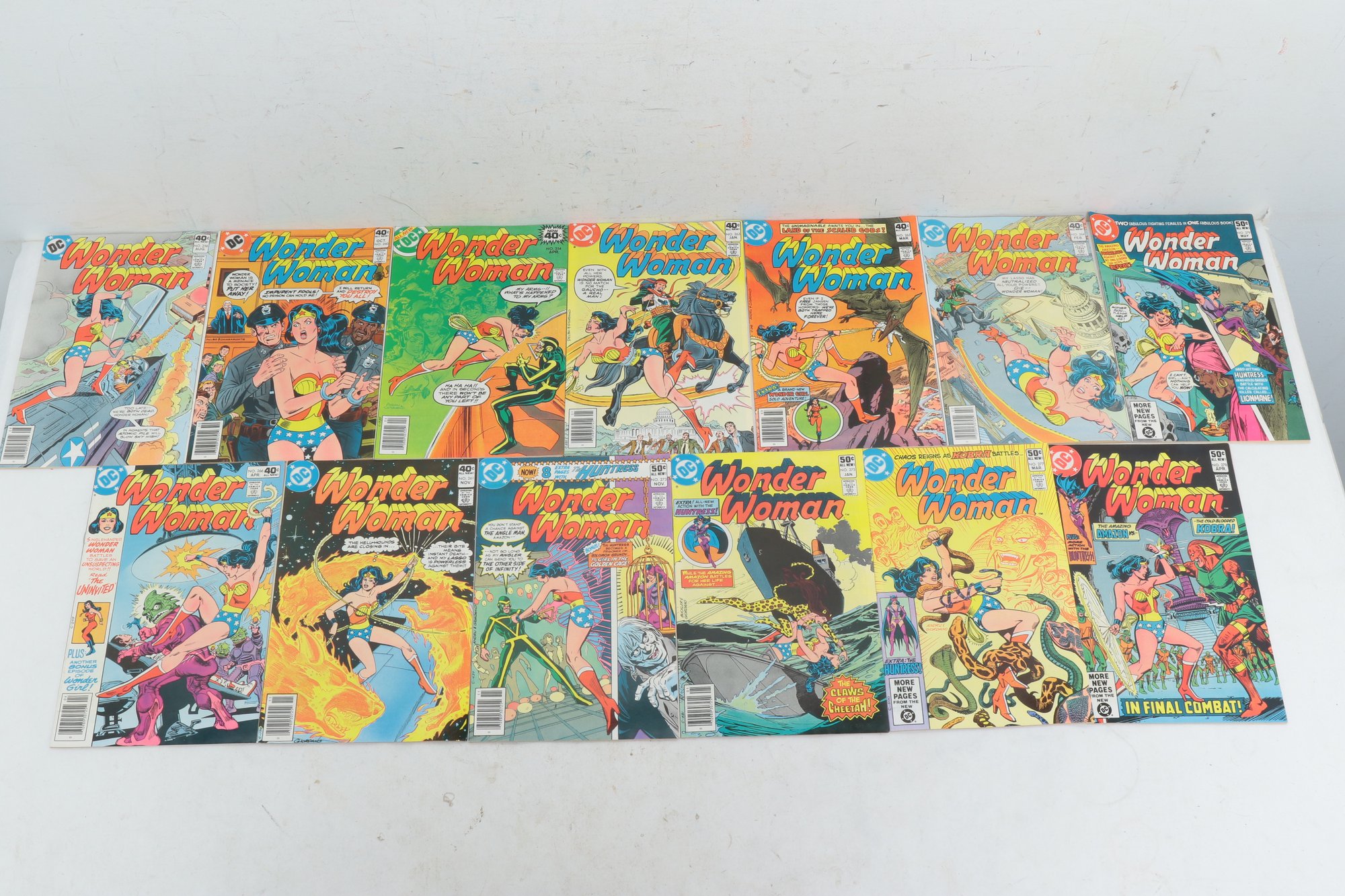 13 DC Wonder Woman 40 Cent Comic Books #198512 | Auctionninja.com