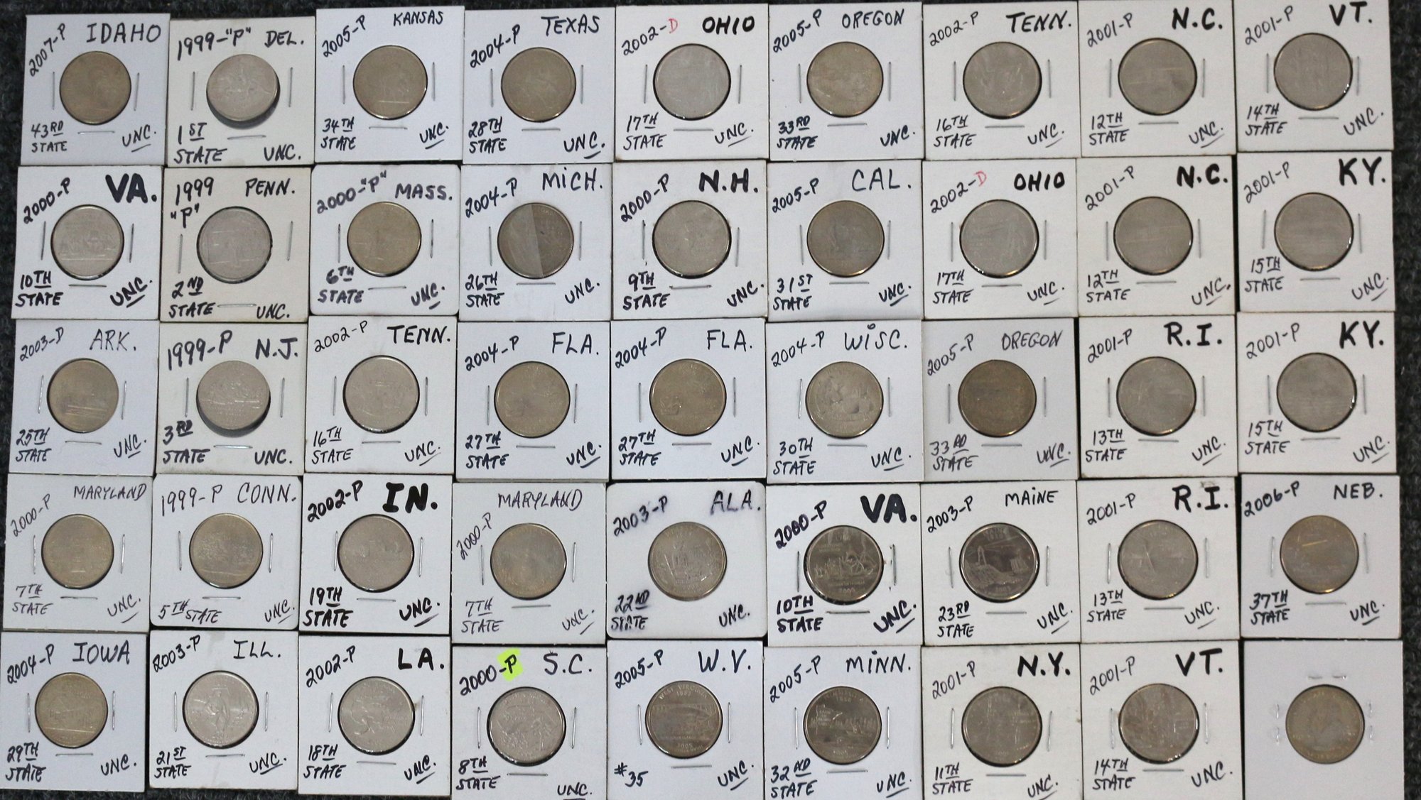 Group Of 45 Uncirculated State Quarters In 2 X 2 Holders - Various ...