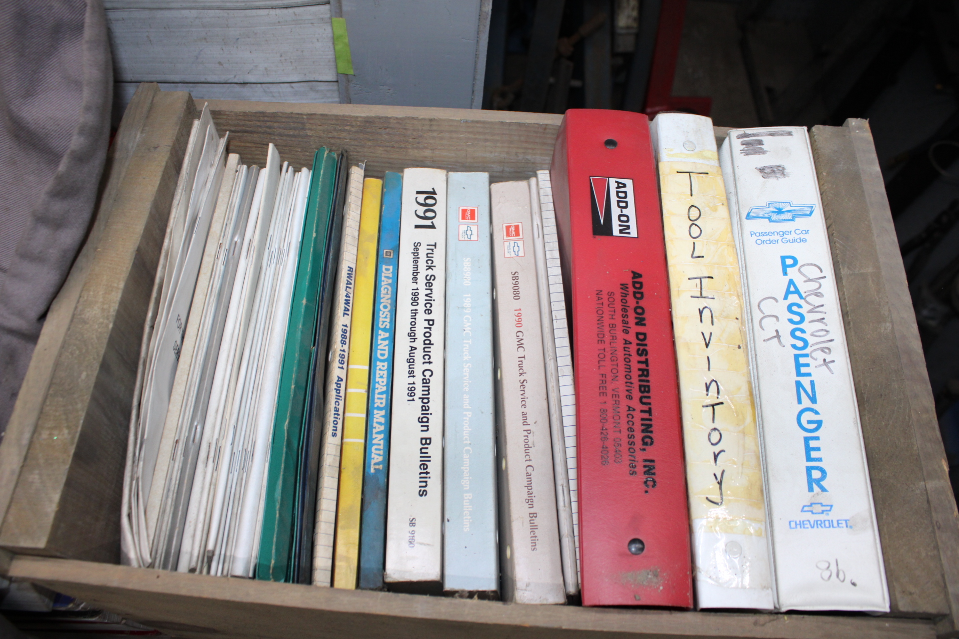 4 Wood Boxes Of Misc Make Model Year GM Manuals #5531 | Auctionninja.com